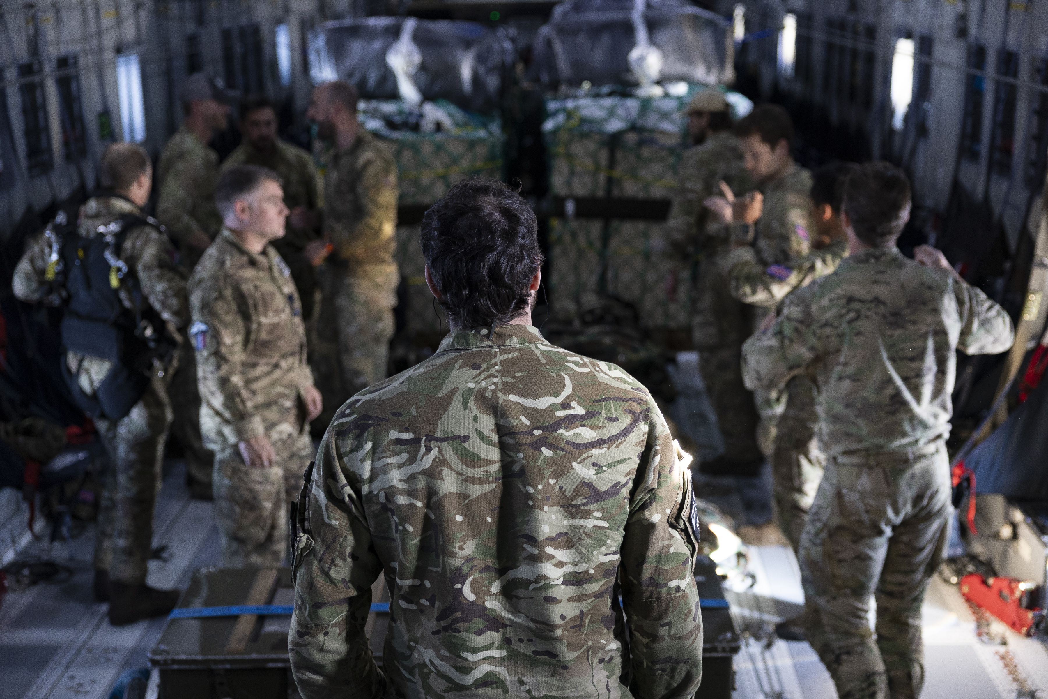 Soldiers parachute in to help remote island